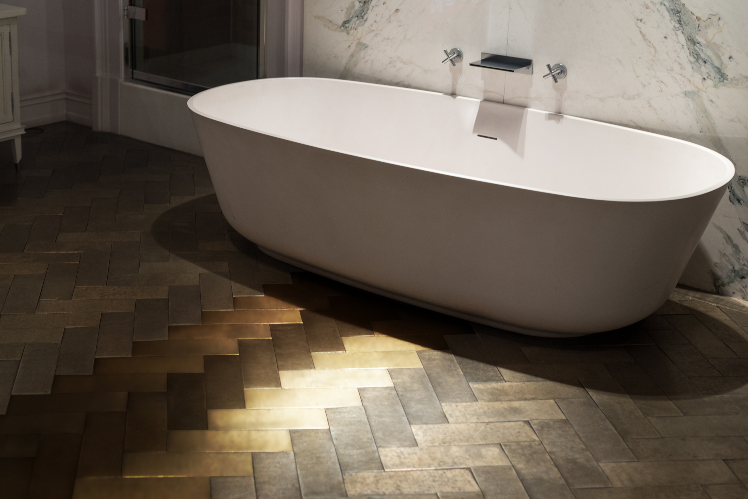 Questech – Cast Metal & Cast Stone Decorative Tiles & Accessories